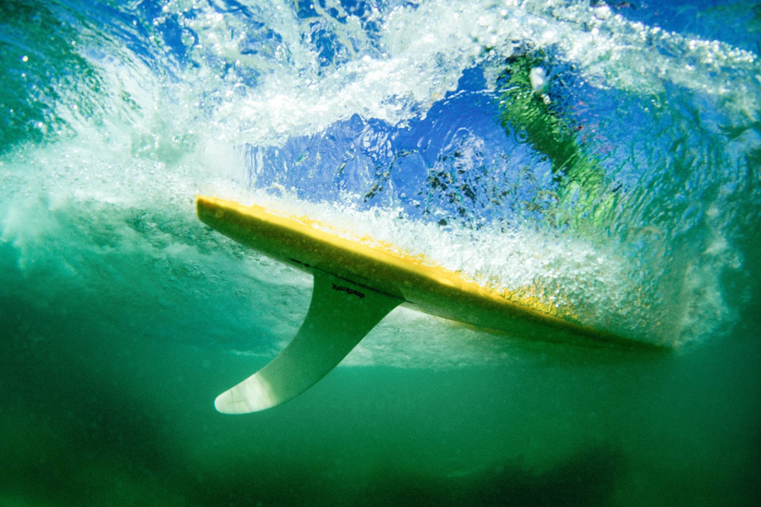 Surfboard Fin Setups: Understanding Single, Twin, Thruster, and Quad Fins