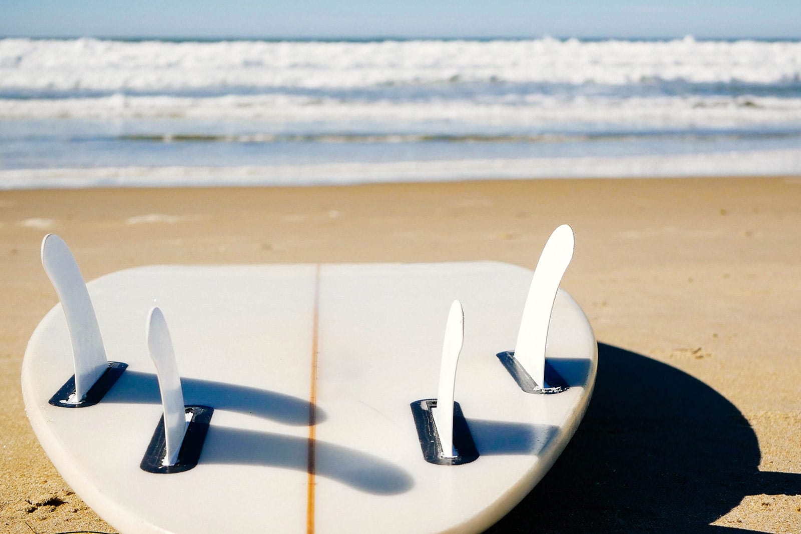 Surfboard Fin Setups: Understanding Single, Twin, Thruster, and Quad Fins