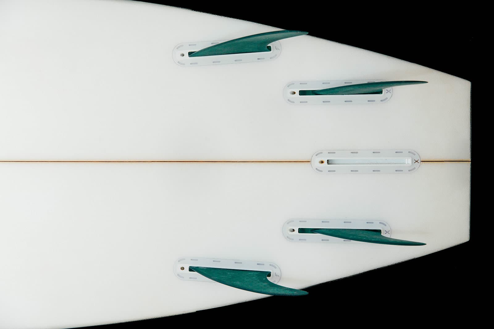 Surfboard Fin Setups: Understanding Single, Twin, Thruster, and Quad Fins
